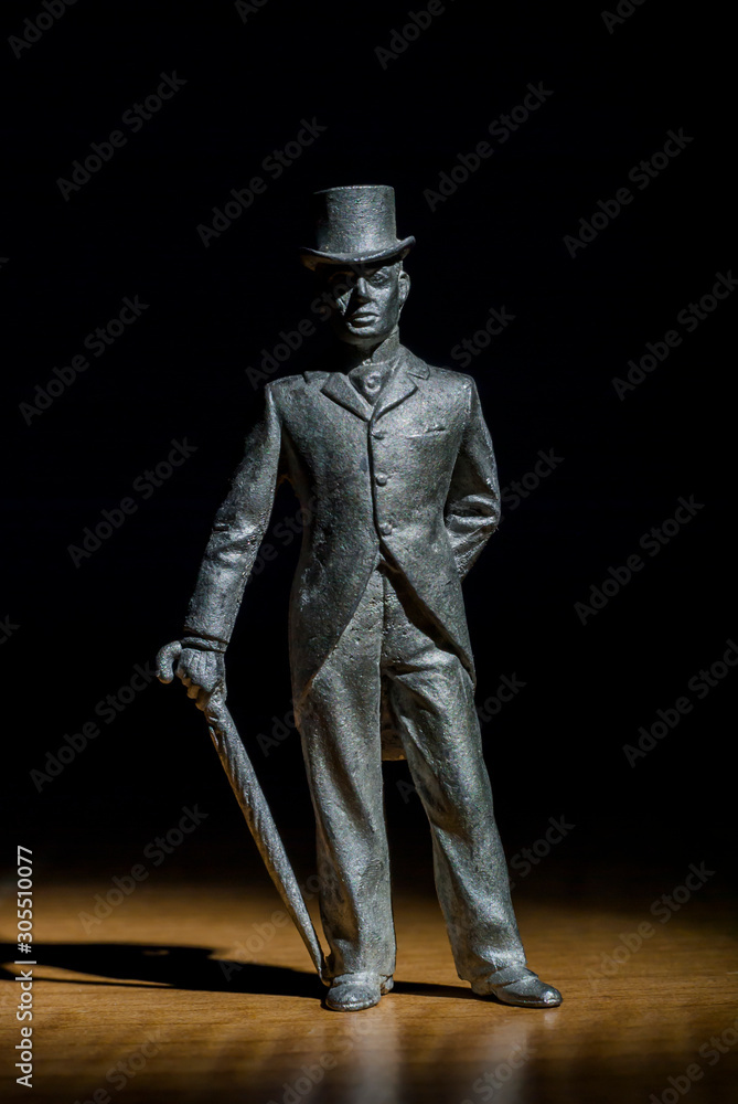 Foto de Victorian gentleman model, standing with umbrella top hat and ...