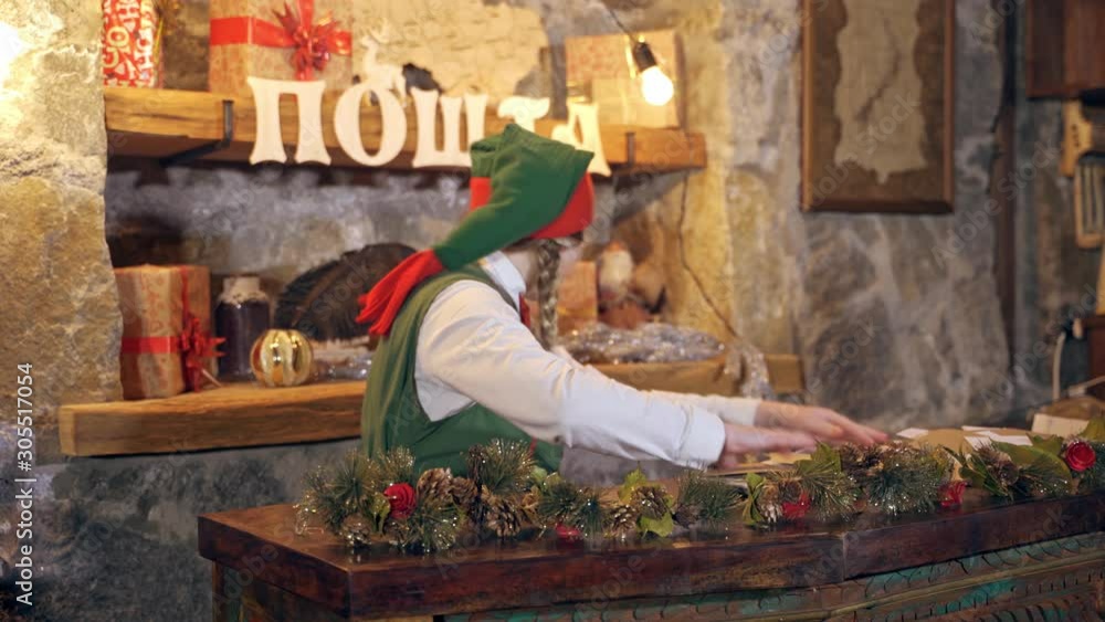 Elves with envelopes. Fairy characters in green costumes with letters ...