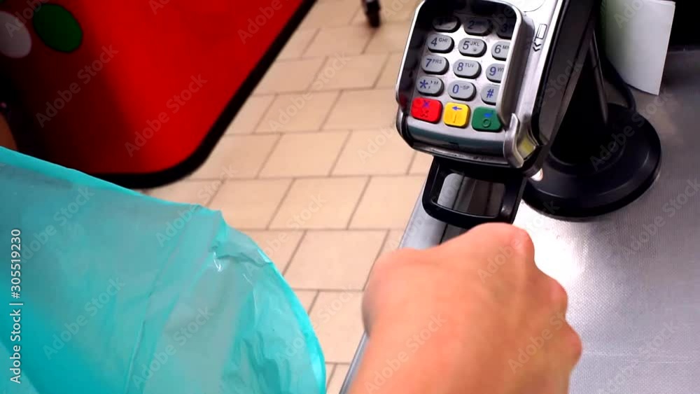 credit card settlement machine. Shopping at the grocery store ...