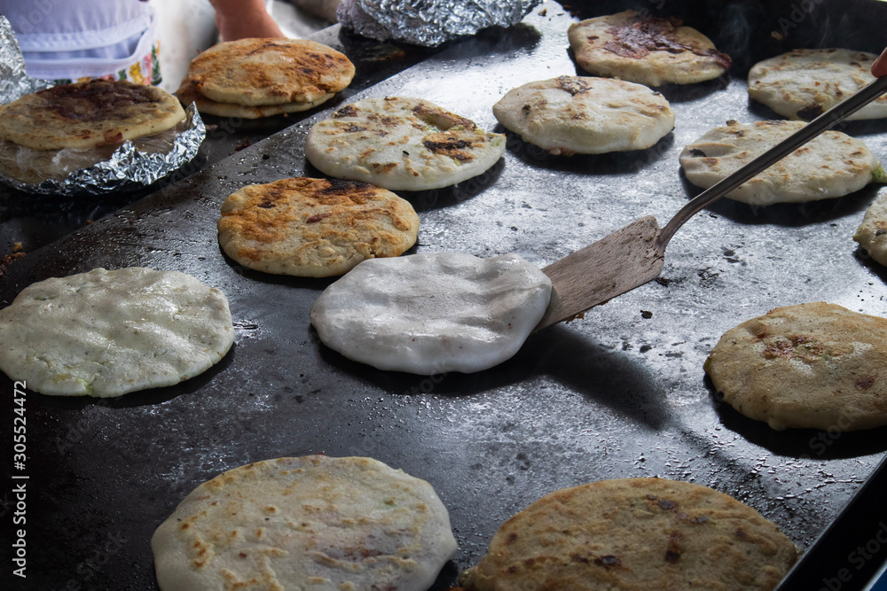 Pupusas, comida típica en El Salvador Stock Photo | Adobe Stock