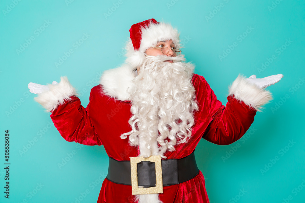 Santa holding hands as he has no idea about something Stock Photo ...