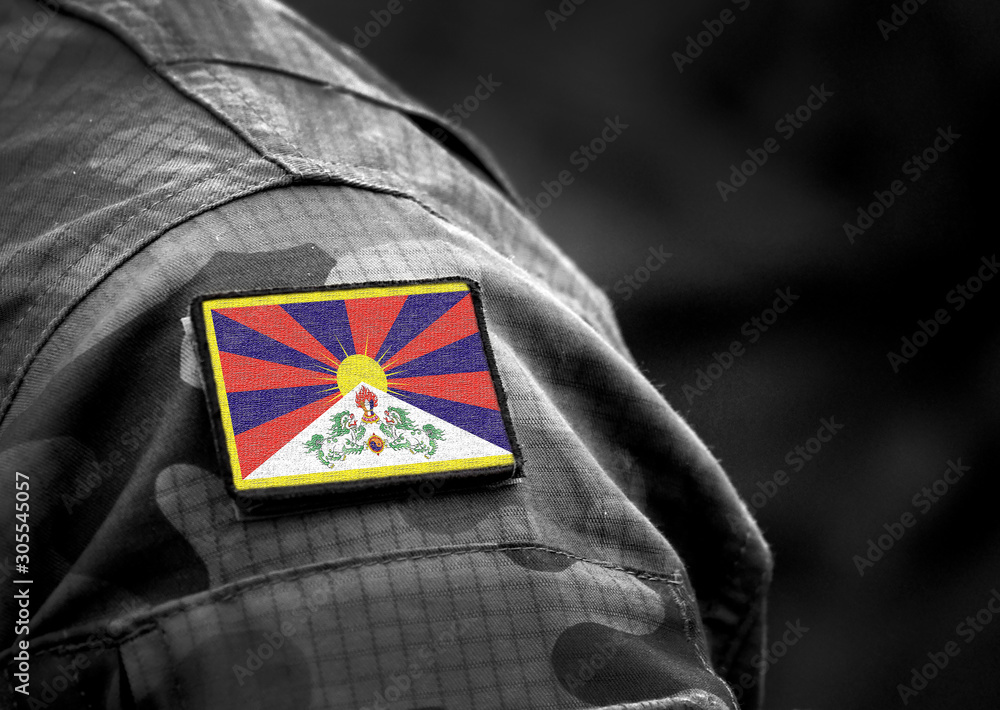 Flag of Tibet on military uniform. Army, armed forces, soldiers ...