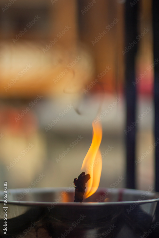 Single fire light lit and float on the oil lamp.Chinese shrine Fire Oil ...