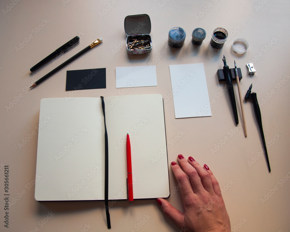Opened white empty notebook and business card mockup. Drawing and ...