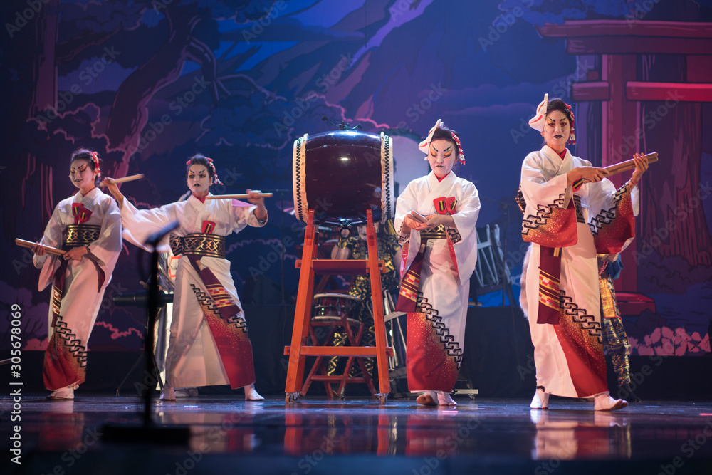 Traditional Japanese performance. Group of actresses in traditional ...