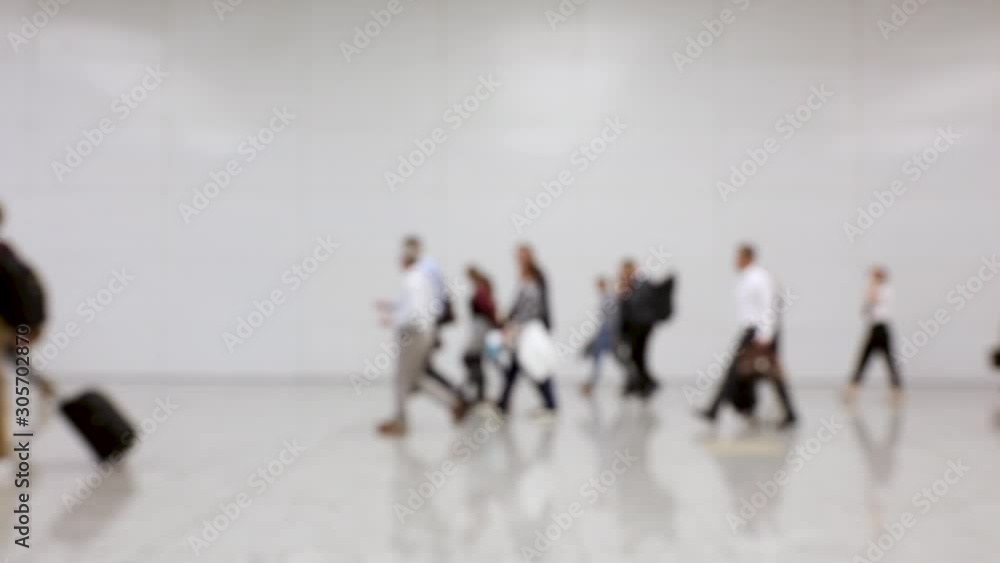 Blurred crowd of people passing by in one direction Stock Video | Adobe ...