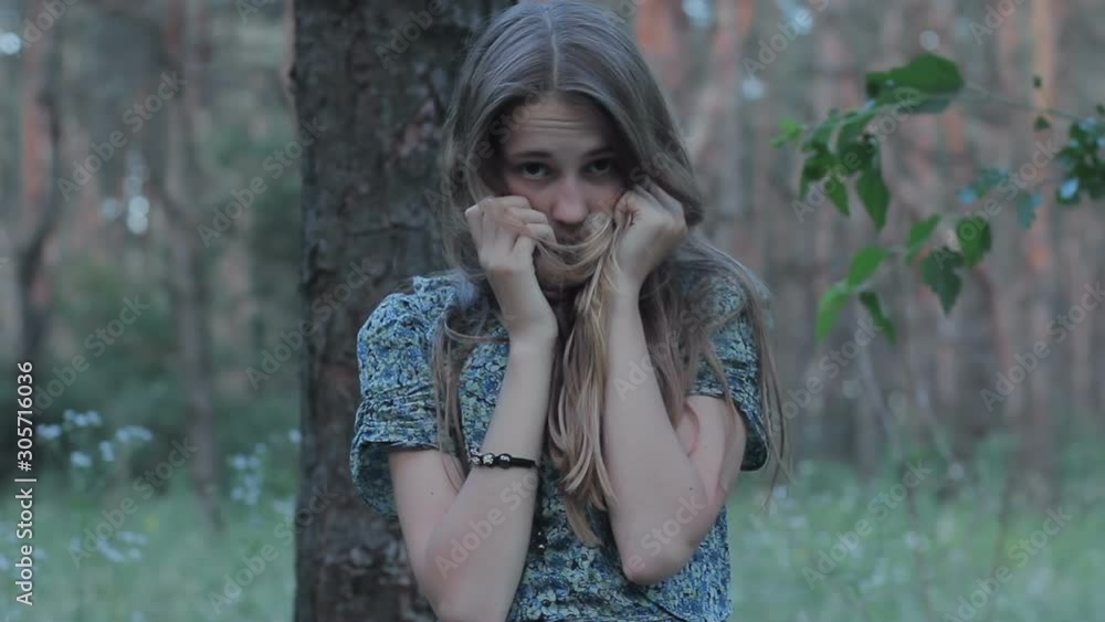 Vidéo Stock Haunted ghost girl in dark forest. Portrait of beautiful ...
