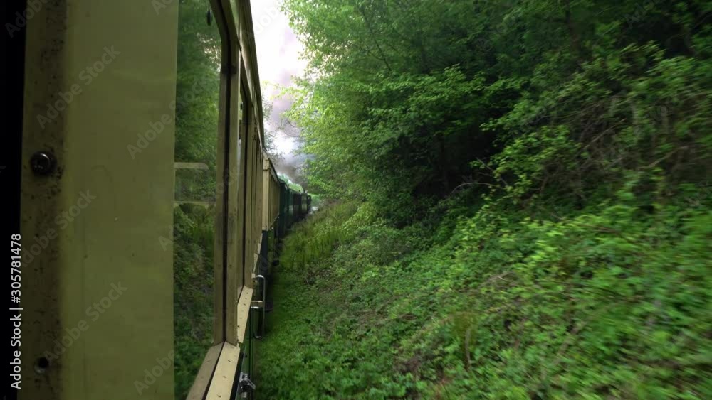 view from the window of a retro train wagon, Old steam locomotive in ...