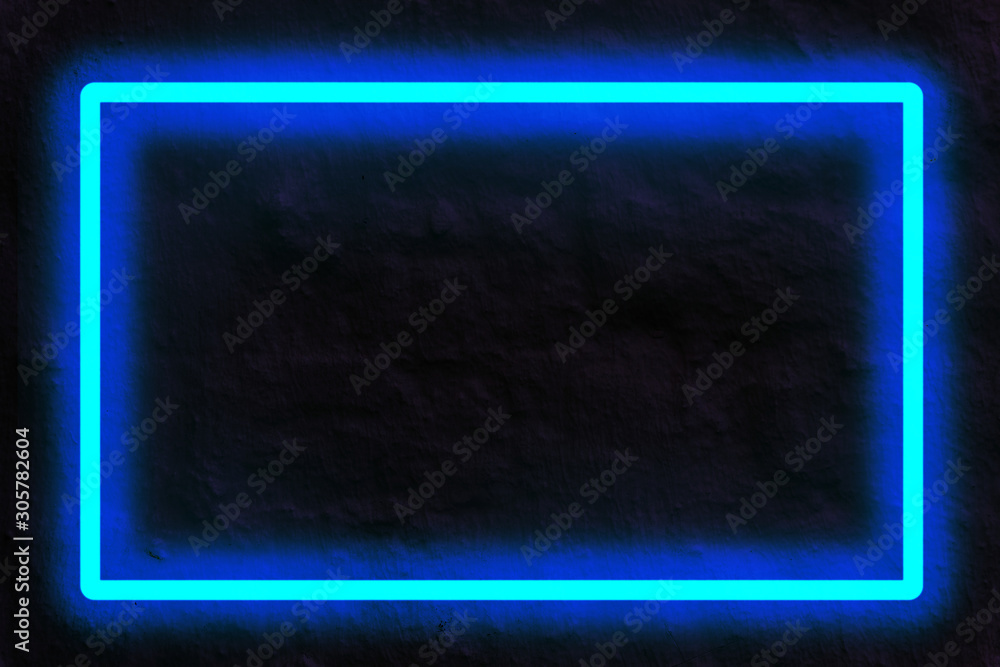 blue neon light on a brick wall at night Stock Photo | Adobe Stock