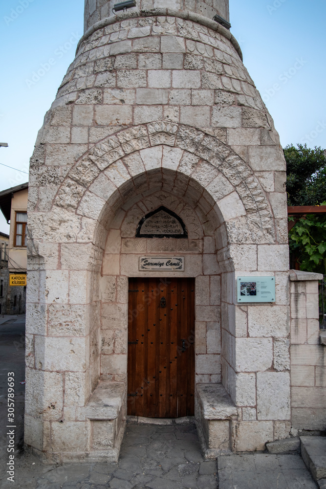 Entrance gate unde rthe minaret of Sarimiye mosque Stock Photo | Adobe ...