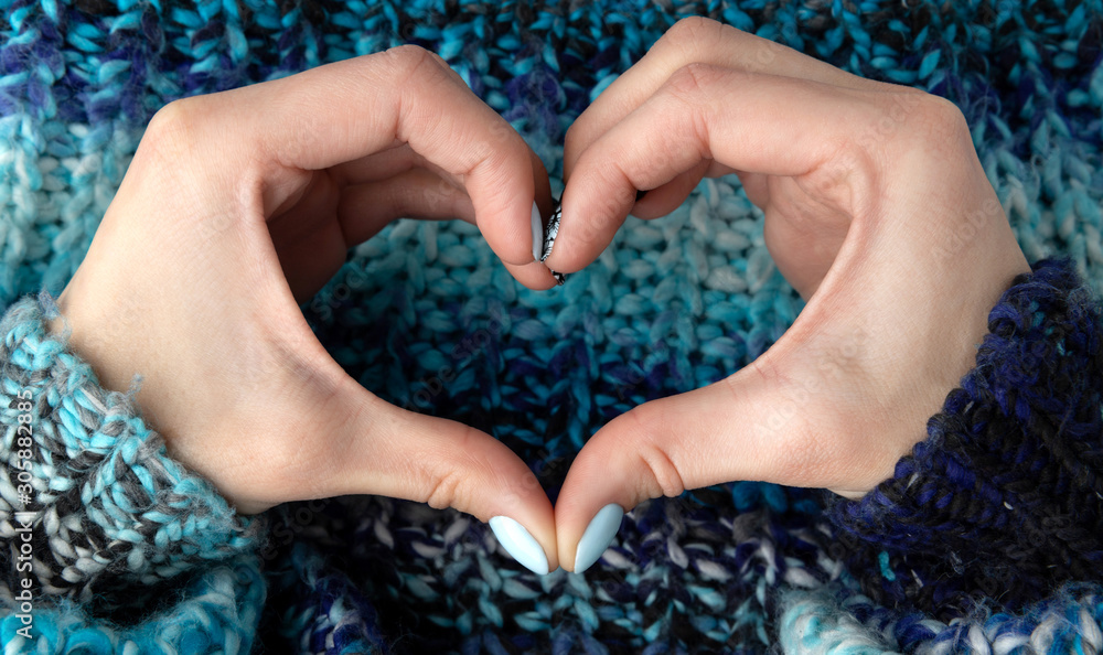 Beautiful young womans hands with manicure in heart shape sign Stock ...