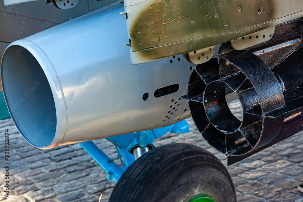Air bomb suspended under the wing of an aircraft. Rocket pod with empty ...