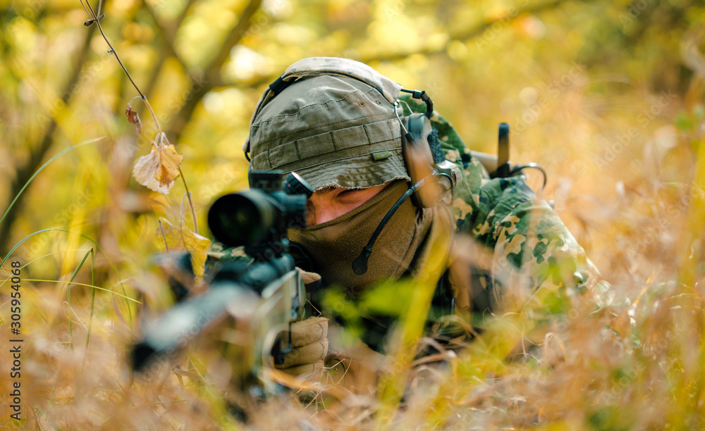 Closeup man in uniform with sniper rifle, front view. Airsoft soldier ...
