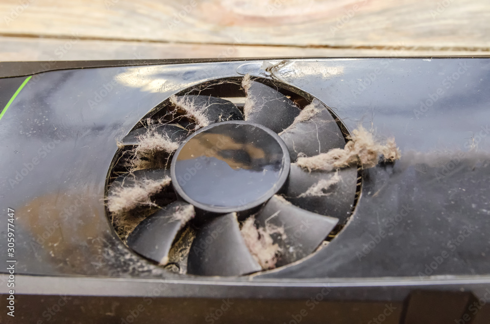 Dusty video card from a computer close up on a wooden background Stock ...