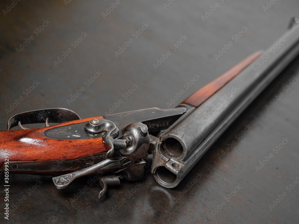 Shotgun. The old gun. Double-barreled gun. Retro weapon. Rifle. Iron ...