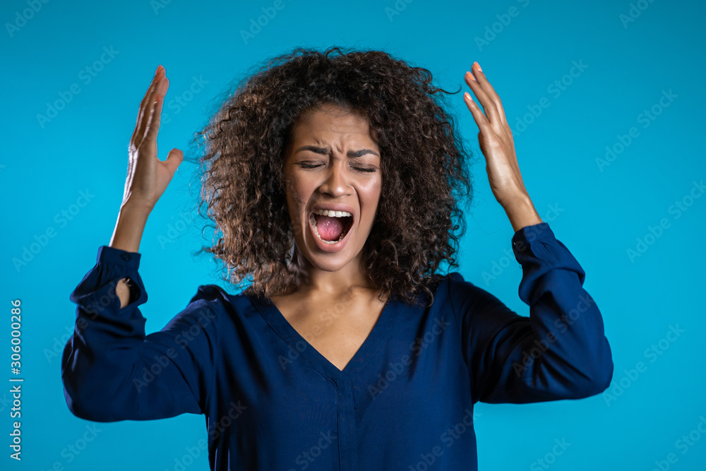 Angry annoyed woman raising hand up to say no stop. Sceptical and ...