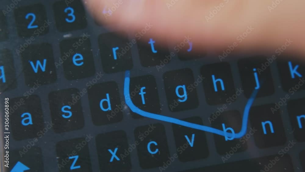 young man uses modern cell phone for texting message with keyboard on ...