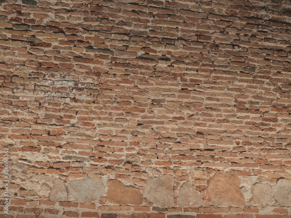 Brick wall arch of the old temple. The texture of the brickwork in a ...