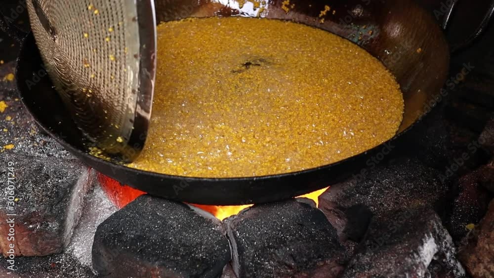 Indian street food. Boondi or Bundiya is an Indian dessert made from ...