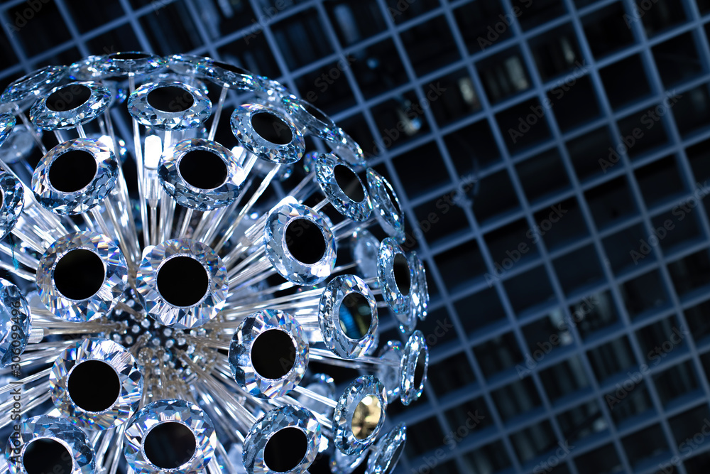Crystal chandelier with round mirror plates, geometric background ...