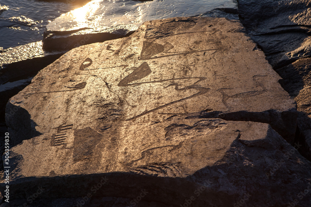Poster ancient rock carvings petroglyphs on the shore of Onega Lake ...