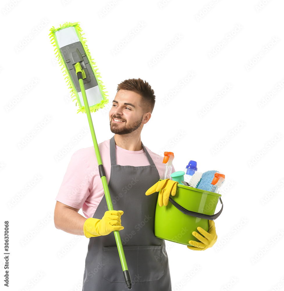 Male janitor with cleaning supplies on white background Stock Photo ...