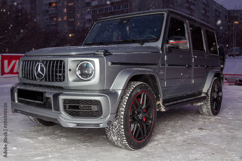 Exhibition at the street near dealership with gray matte car Mercedes G ...
