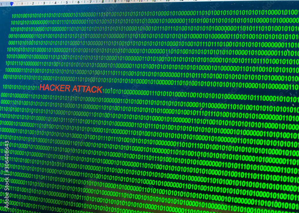 Red inscription Hacker Attack in malicious computer code written by a ...