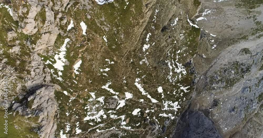 Nauseating top down aerial view on mountain ridge in the Italian Alps ...