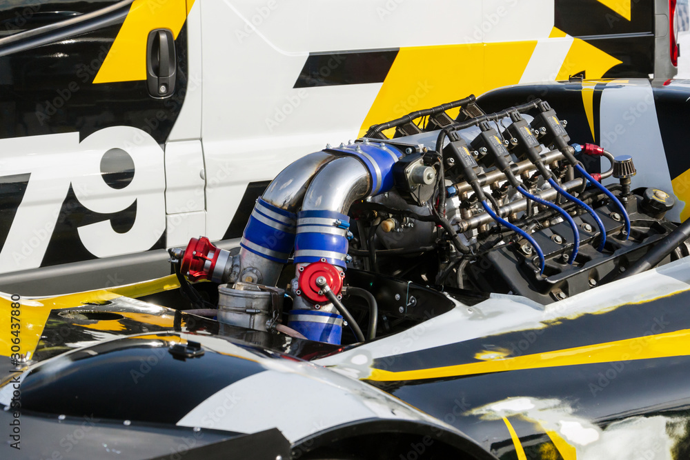 engine of a powerful racing car. dragster. race car concept. the car is ...
