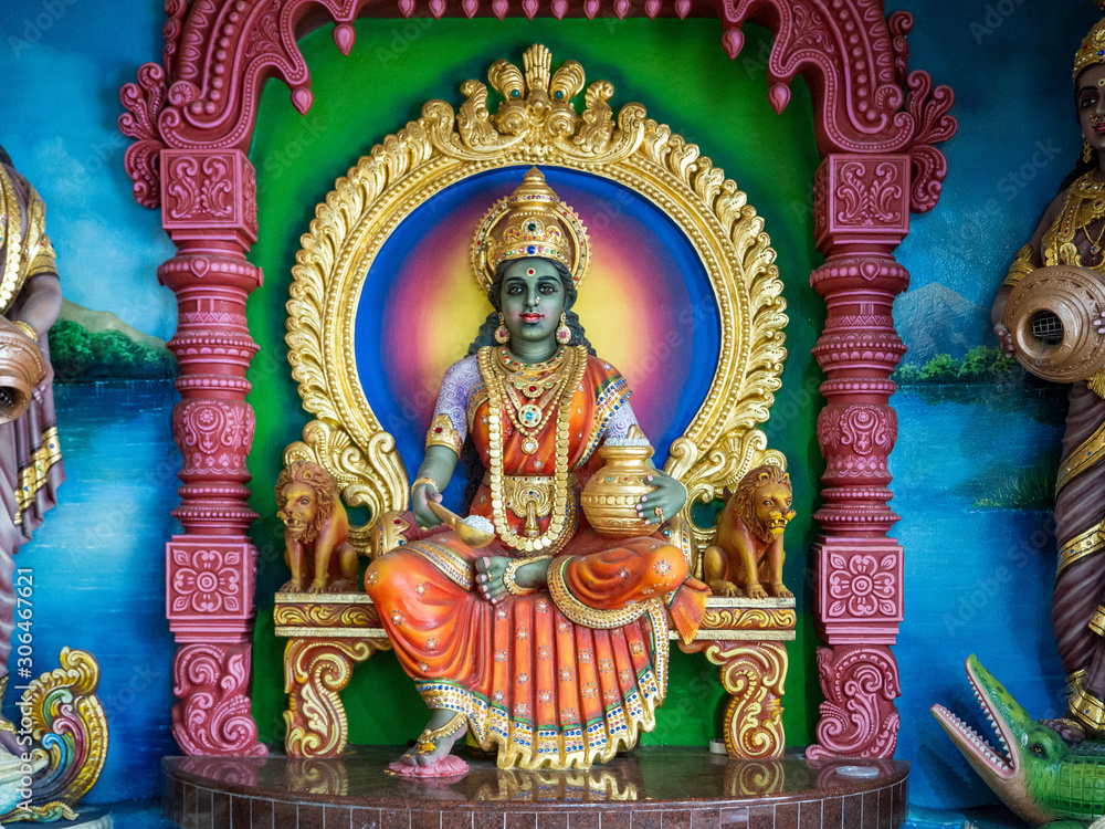 Colourful statue of Hindu religious deity in Hindu temple in Singapore ...
