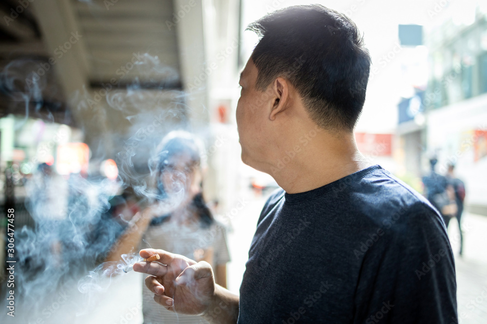 People Smoking Cigarettes In Public
