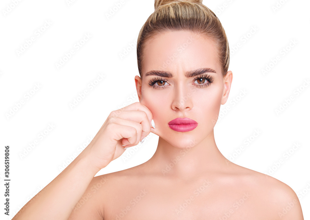 Beautiful blonde woman stretches out the skin on face. Stock Photo ...