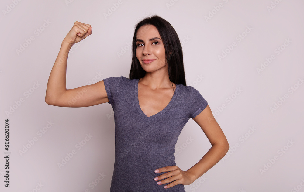 Strong woman. Close-up photo of a beautiful woman with straight dark ...