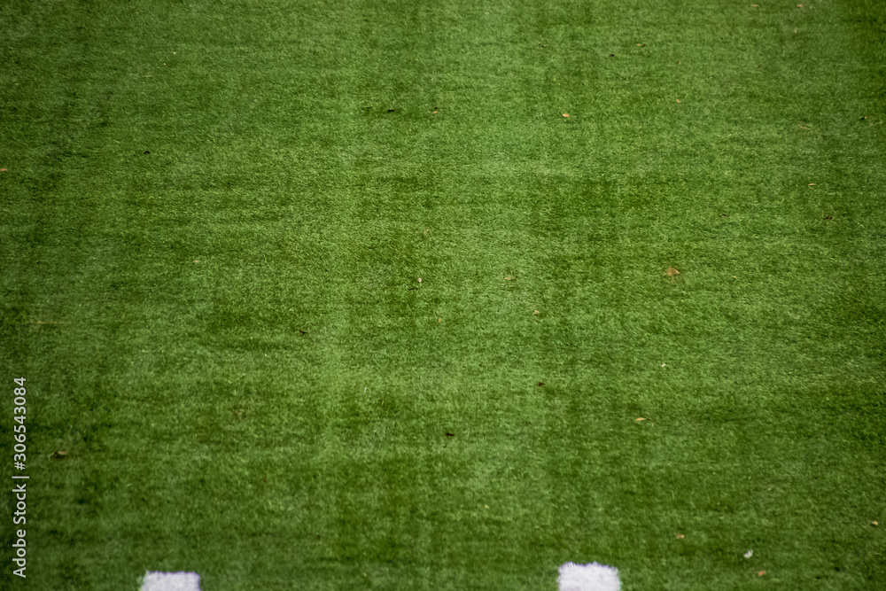 View of artificial turf of American football field with small view of ...