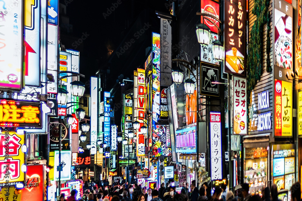 Shinjuku, Japan - April 3, 2019: People walking on famous red light ...