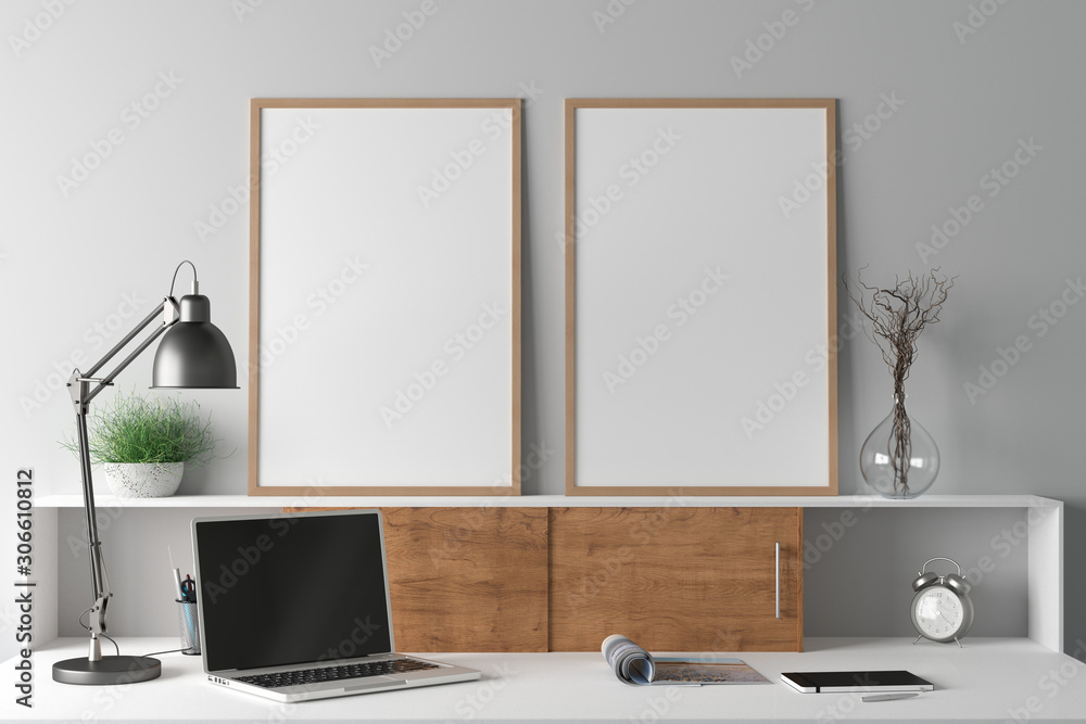 Workspace with two vertical poster mock ups on the desk. Desk with ...