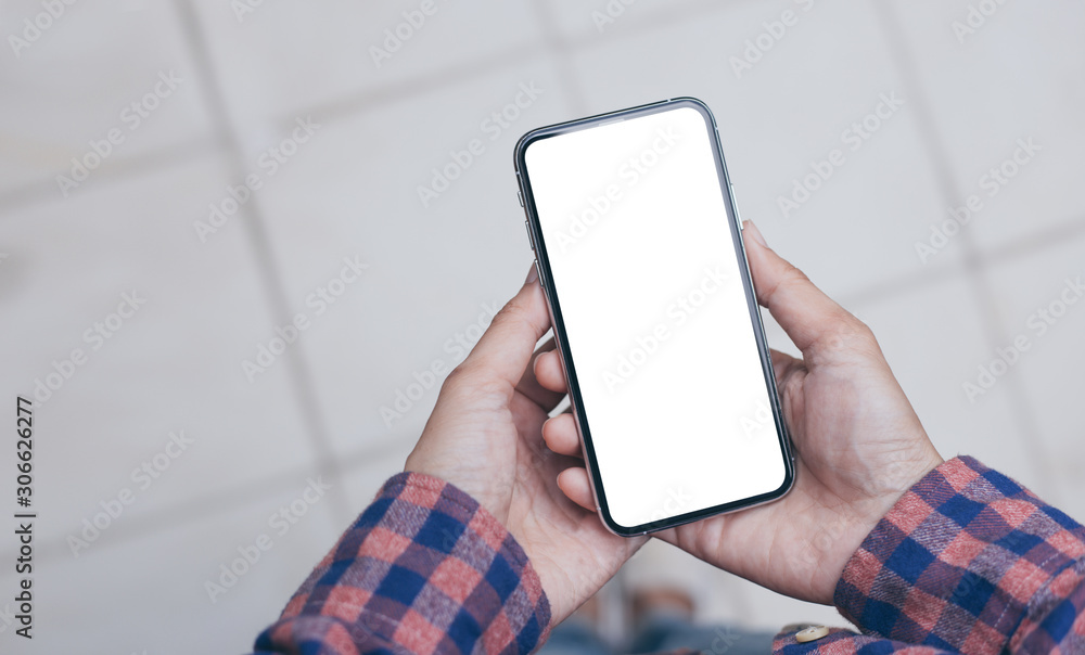Mockup image blank white screen cell phone.men hand holding texting ...