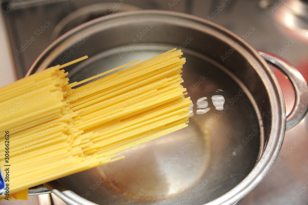 cook pasta at home - boiling water and spaghetti Stock Photo | Adobe Stock