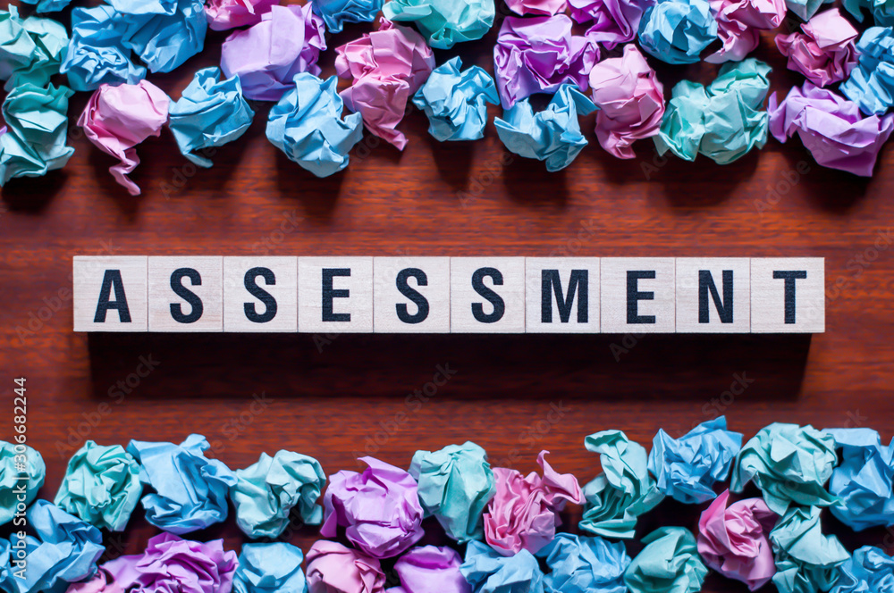 Assessment word concept on cubes Stock Photo | Adobe Stock
