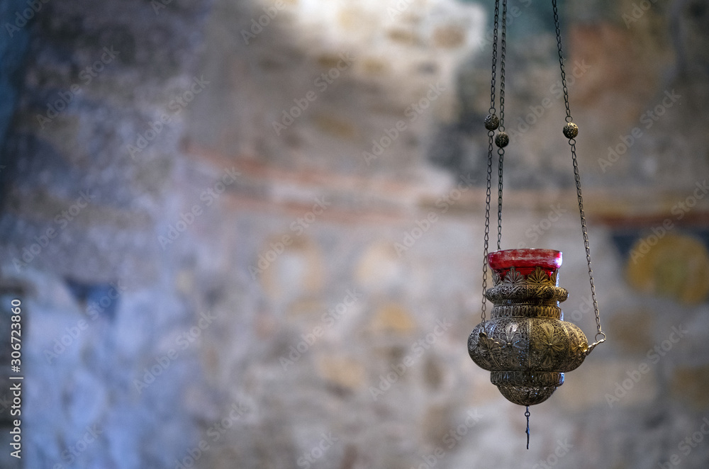 Beautiful cresset in the ancient Orthodox church in Serbia. The ...