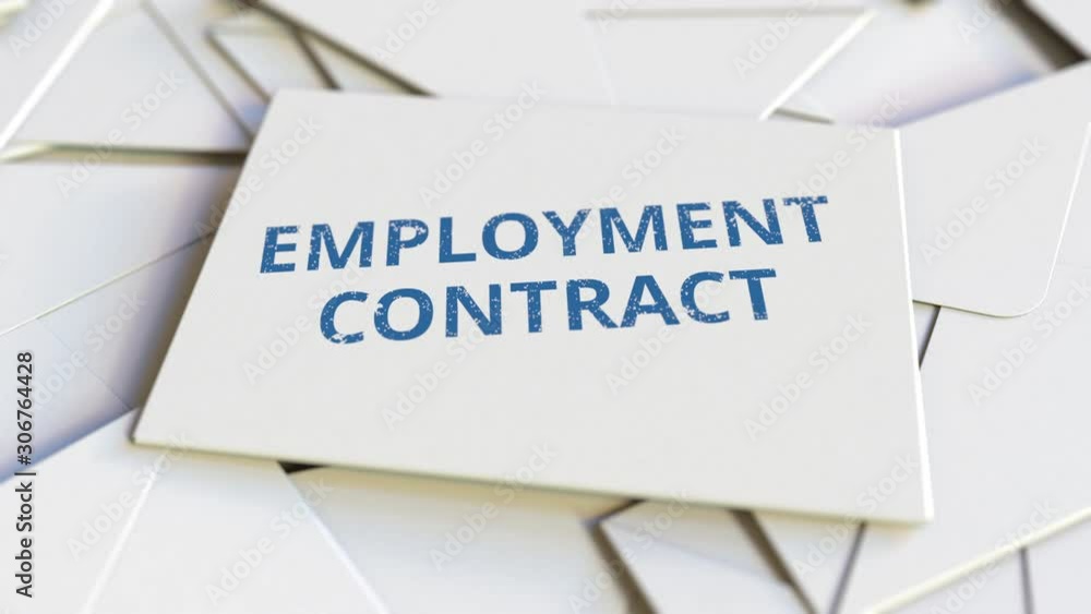 Envelope with employment contract on top of many other envelopes ...