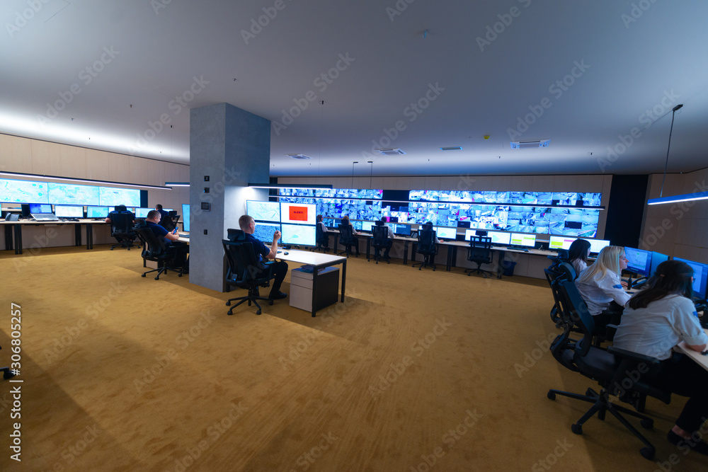 Photo of a Security data center modern offices with multiple displays ...
