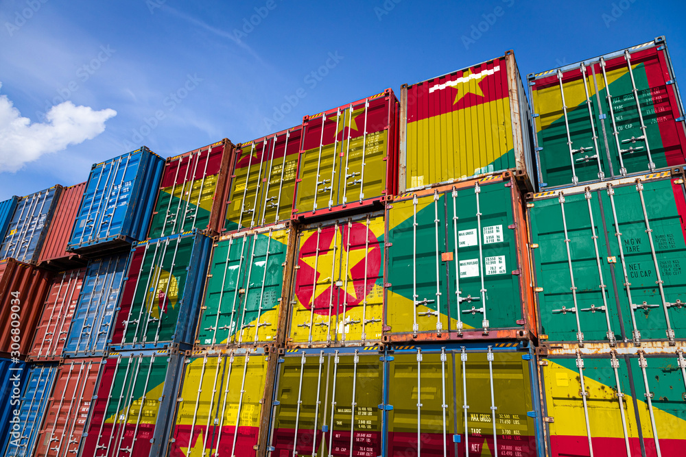 The national flag of Grenada on a large number of metal containers for ...