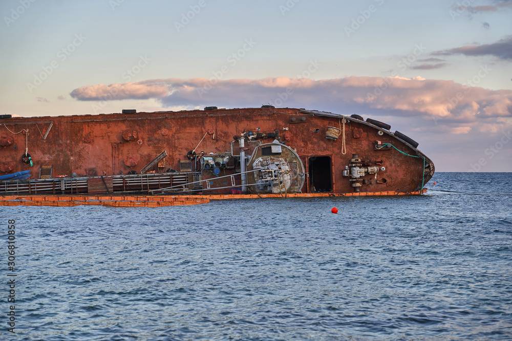 sunken tanker. Tanker Bunker threw storm ashore. The tanker lies on its ...