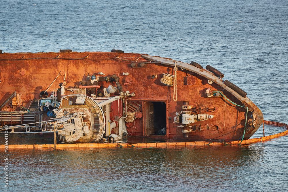 sunken tanker. Tanker Bunker threw storm ashore. The tanker lies on its ...