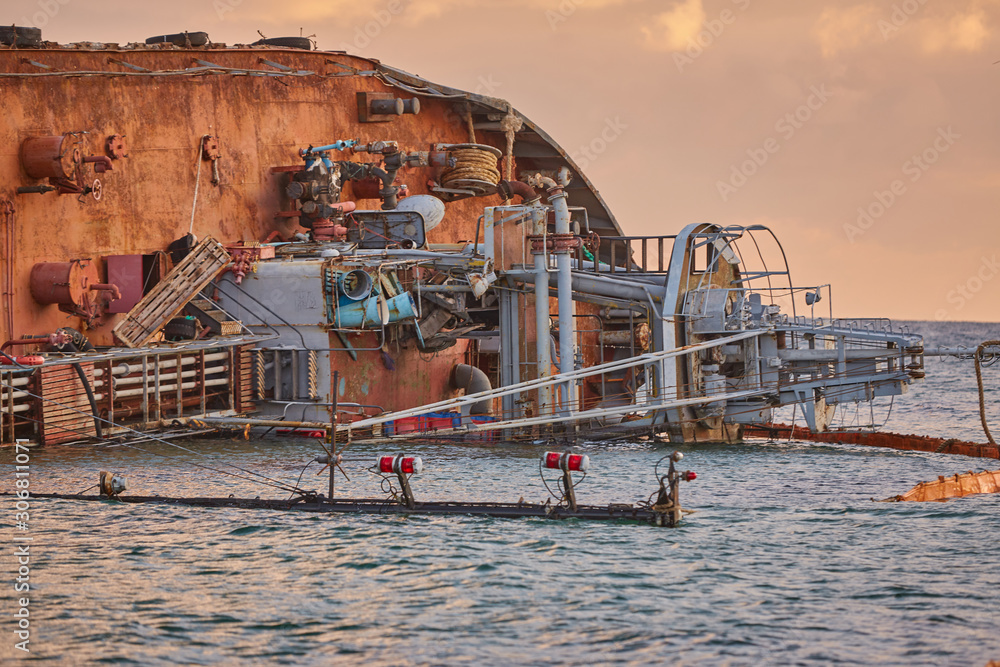sunken tanker. Tanker Bunker threw storm ashore. The tanker lies on its ...