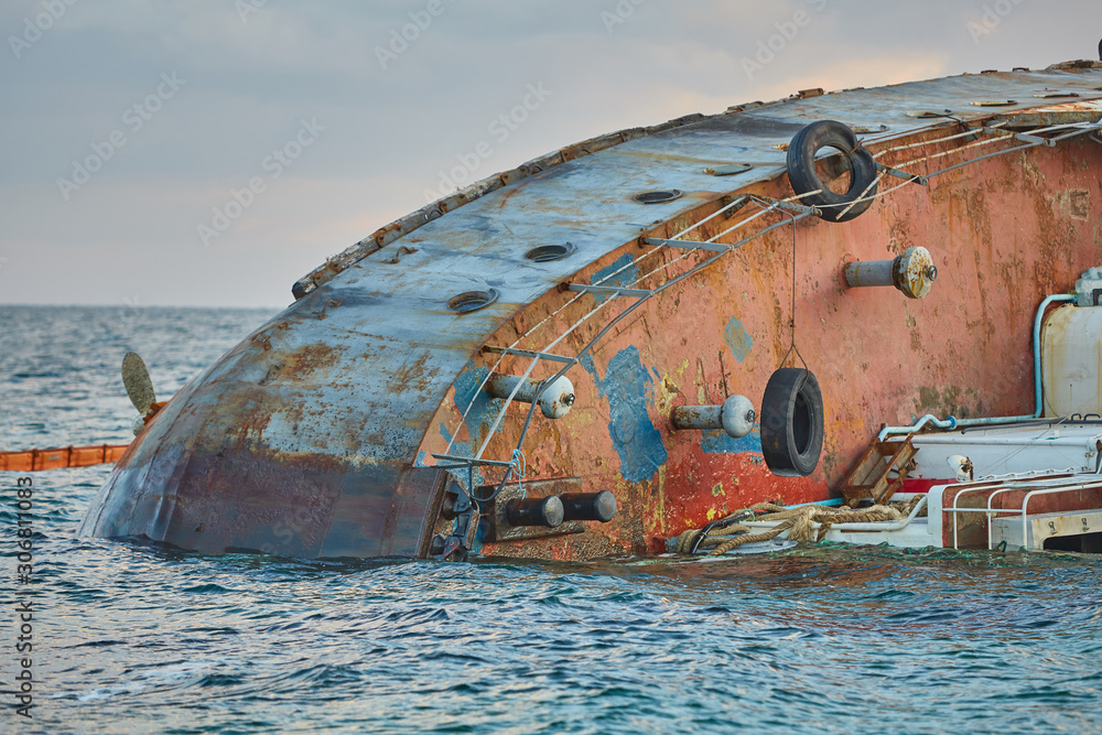 sunken tanker. Tanker Bunker threw storm ashore. The tanker lies on its ...