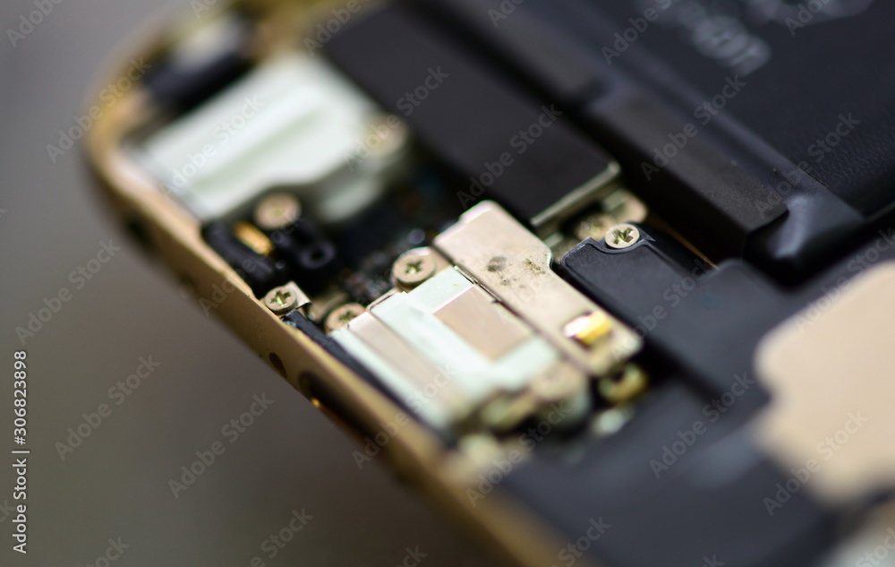 technician repairing broken mobile phone close-up.Close-up Of A Human ...