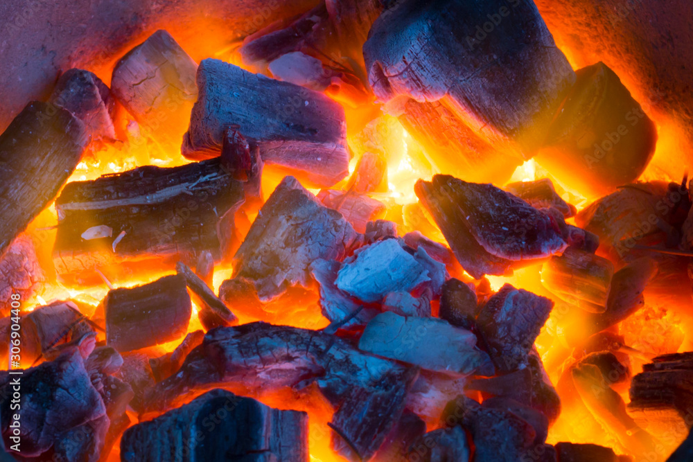 burning charcoal background with fire and sparks.Coals burning ...